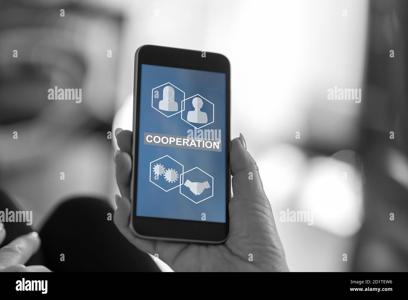 Smartphone screen displaying a cooperation concept Stock Photo - Alamy