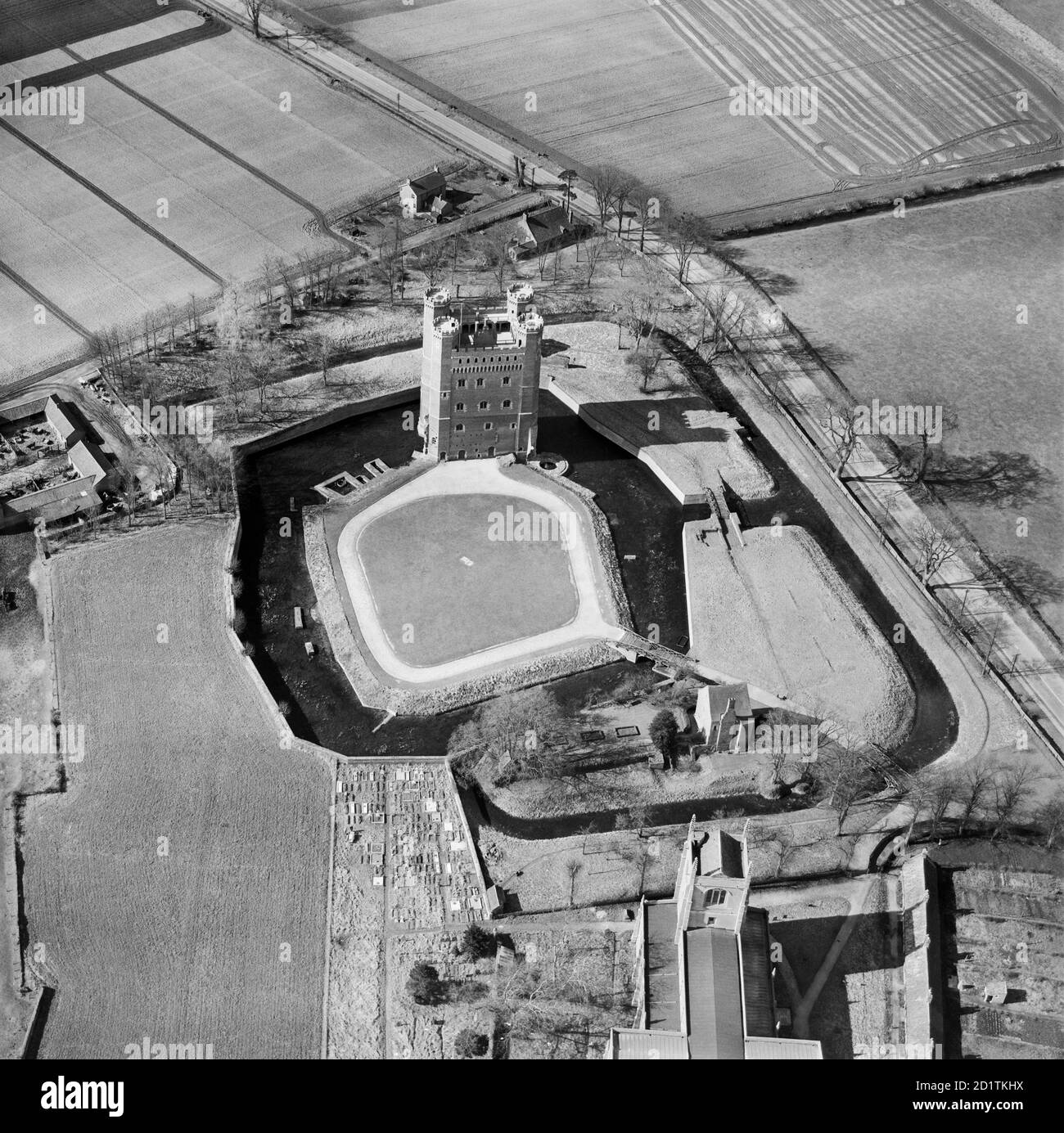 TATTERSHALL CASTLE, Lincolnshire. Aerial view of the tower and moats ...