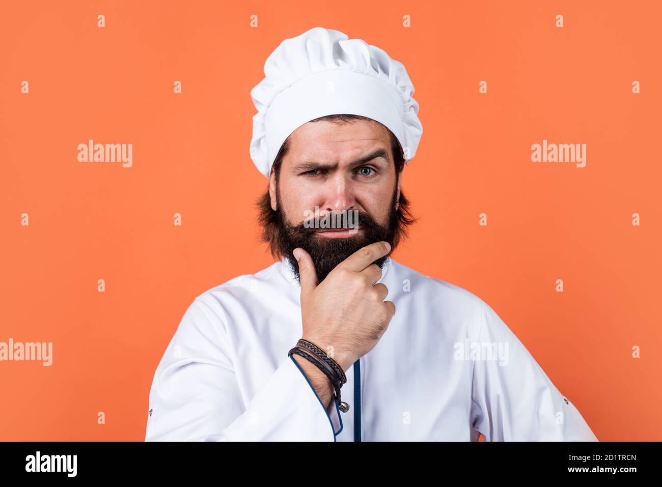 serious professional restaurant bearded cook man thinking about recipe ...