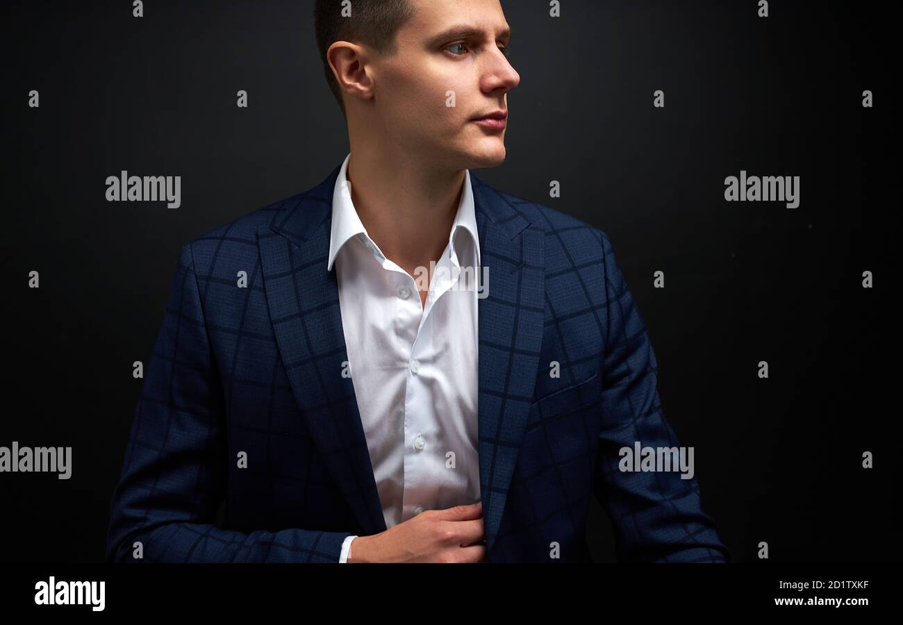 confident trendy caucasian guy in formal stylish suit posing isolated ...