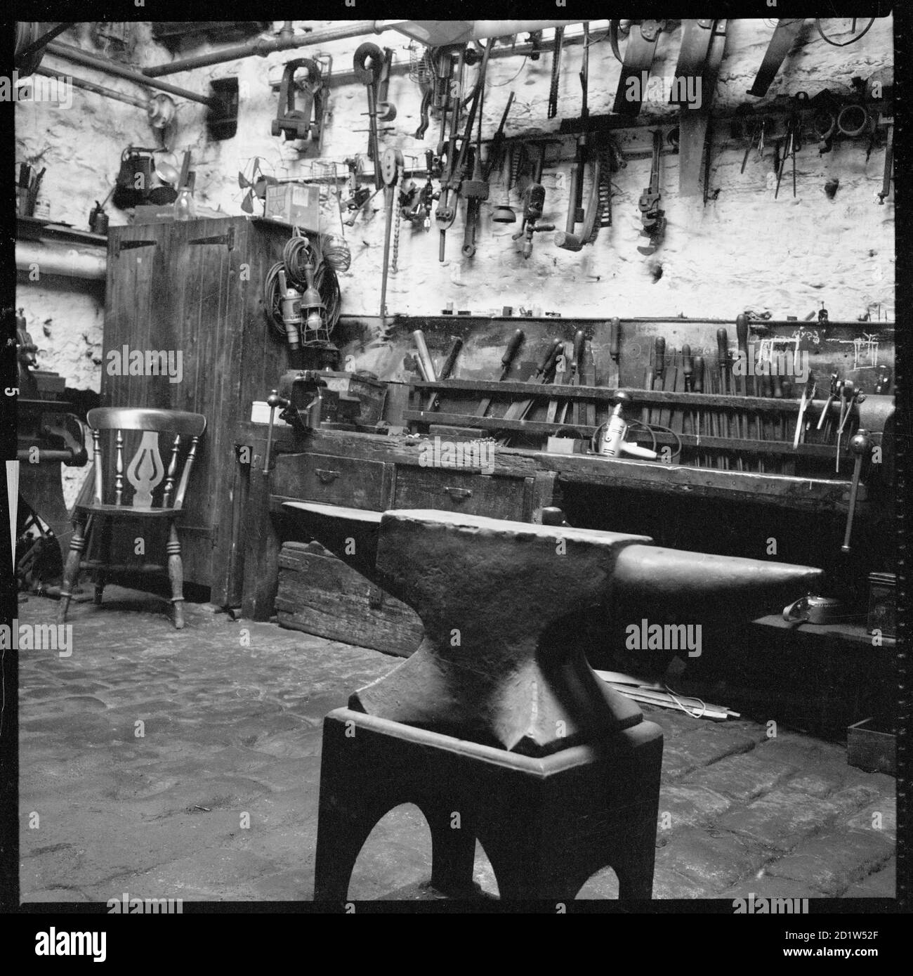 Black and white image of a blacksmiths hi-res stock photography and ...