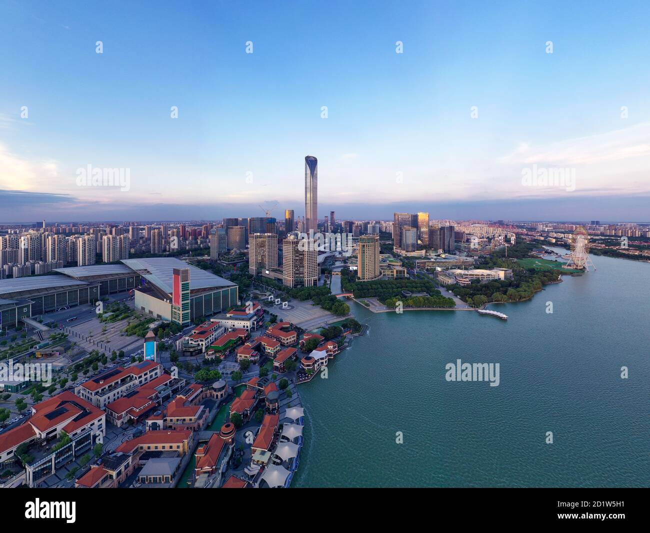 City buildings by Jinji Lake in Suzhou, China. Photo in the industrial ...