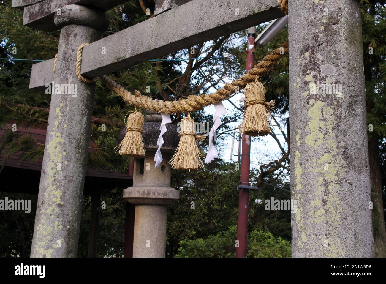 Torii gate and shimenawa rope of Honoohonome Jinja Shrine in Beppu ...