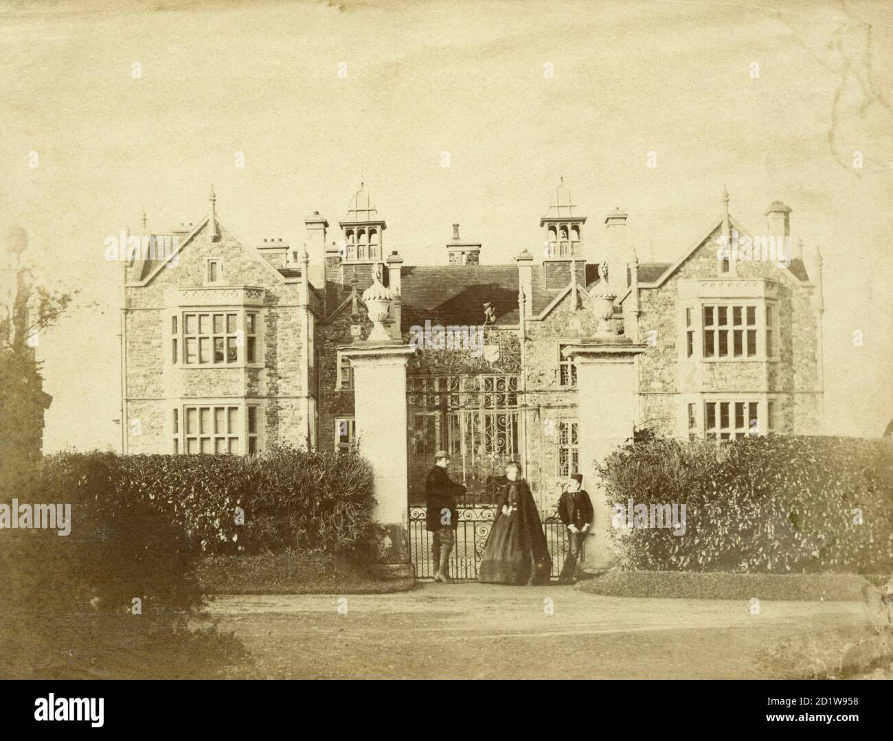 Salt Paper print showing east front of Bradfield House, people standing ...