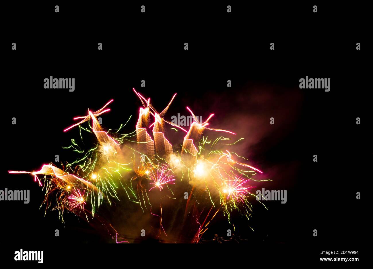 Burning sparklers on black background. Small fireworks giving off ...