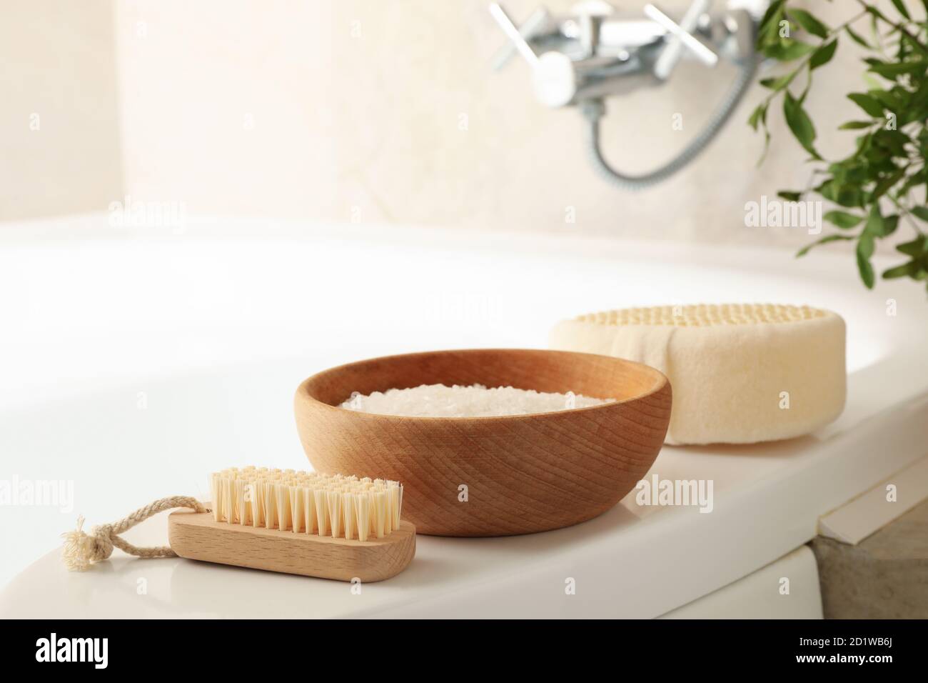 Bath with personal hygiene accessories in light beige bathroom Stock ...