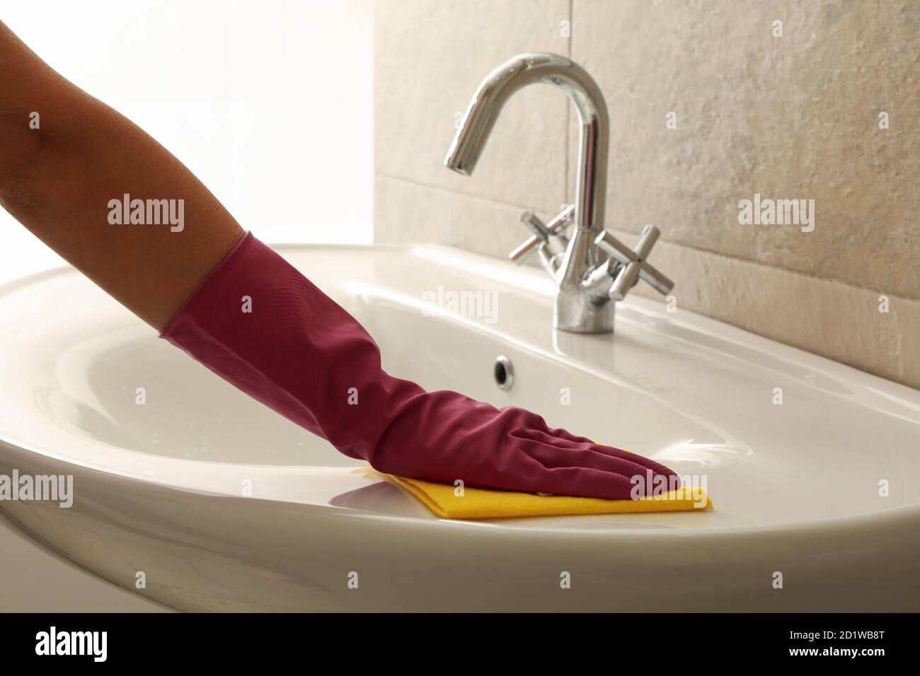 Person in bright pink cleaning hi-res stock photography and images - Alamy