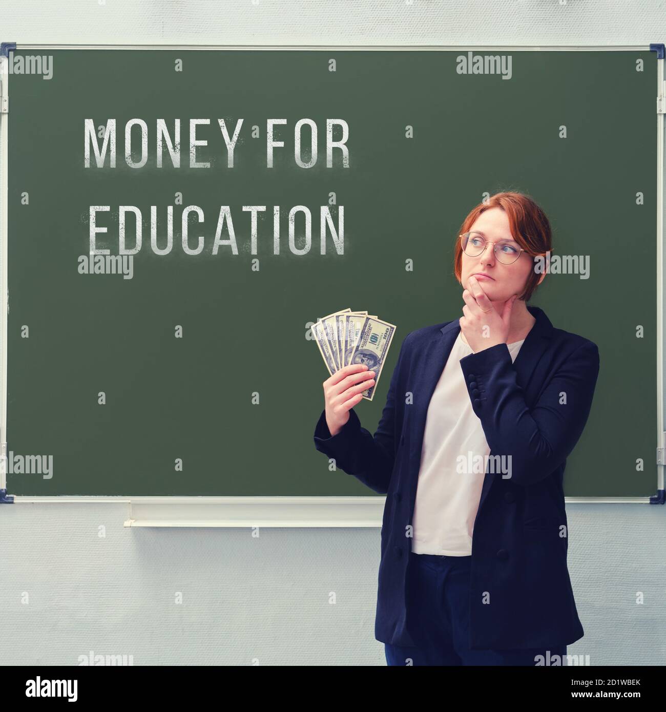 Woman thinking about money dollars hi-res stock photography and images ...