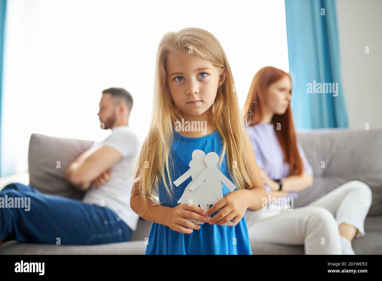 sweet little caucasian child girl holding family picture drawing ...