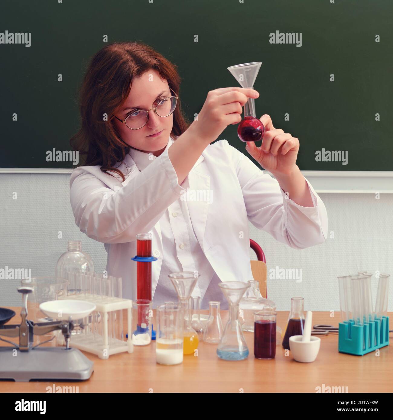 Woman scientist glasses conducts hi-res stock photography and images ...
