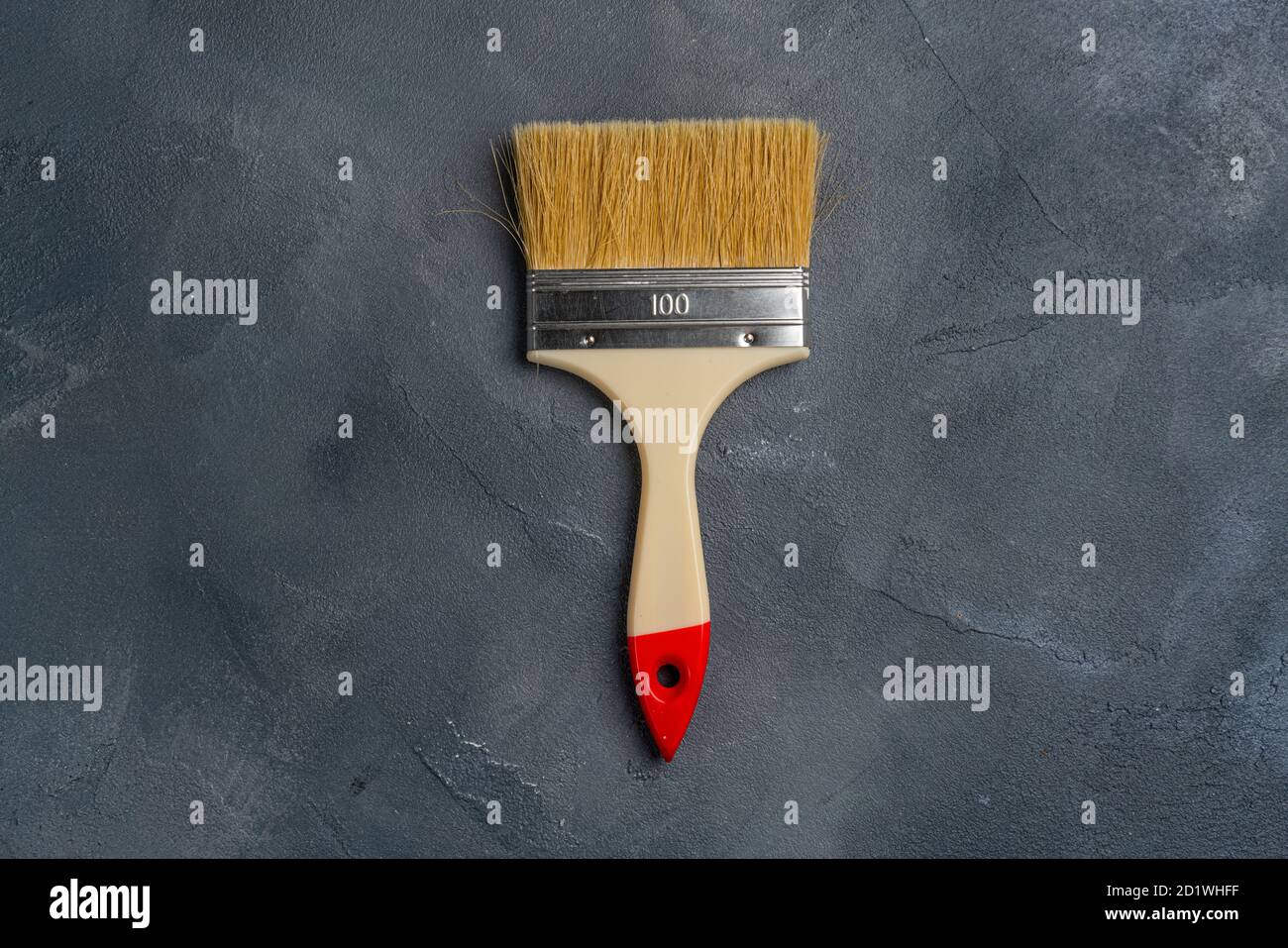 Brush on a gray background. View from above. Free space for an ...