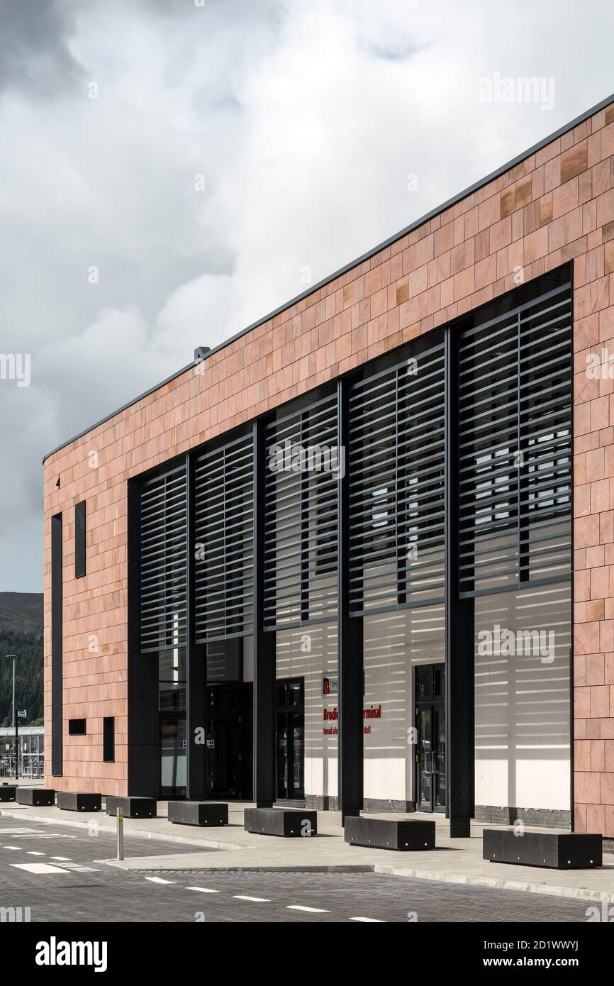 Facade of Brodick Ferry Terminal, clad in red sandstone, Isle of Arran ...