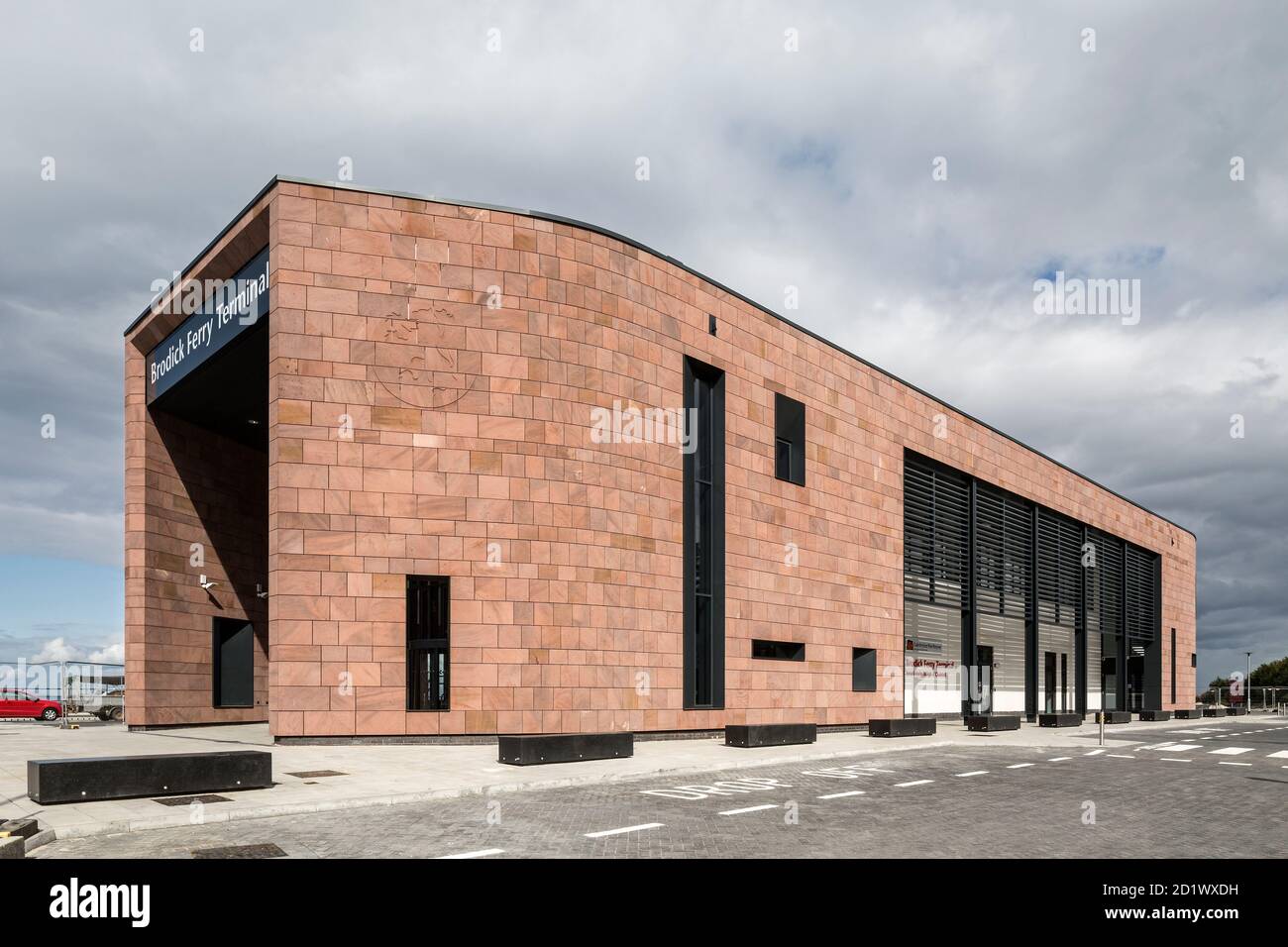 Facade of Brodick Ferry Terminal, clad in red sandstone, Isle of Arran ...