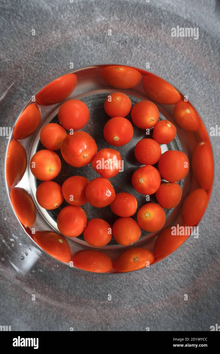 Floating tomatoes hi-res stock photography and images - Alamy