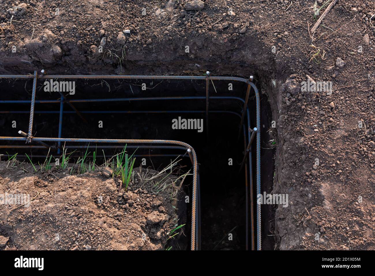 Reinforcement of corners for creating strip foundation for new house ...