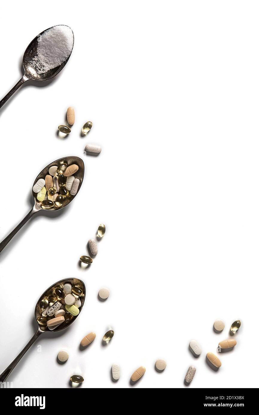 Spoons full of medication and pills and sugar - a spoonful of sugar ...