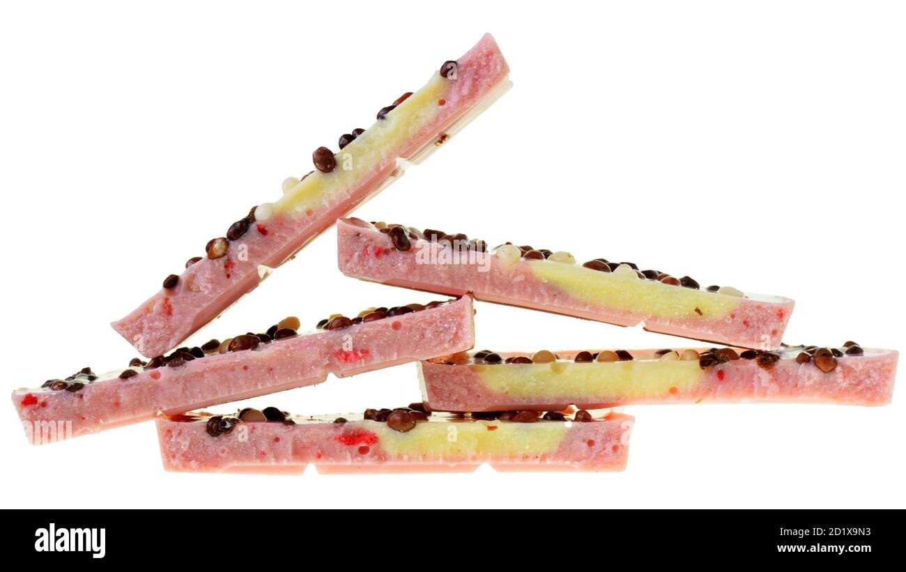Pink chocolate with strawberries and popped rice isolated on a white ...