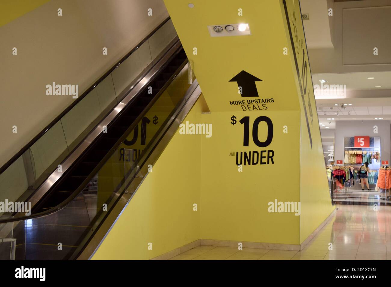 Yellow store escalator hi-res stock photography and images - Alamy