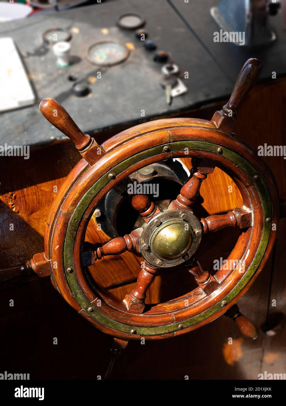 Sailing yacht control wheel and navigation implement Stock Photo - Alamy