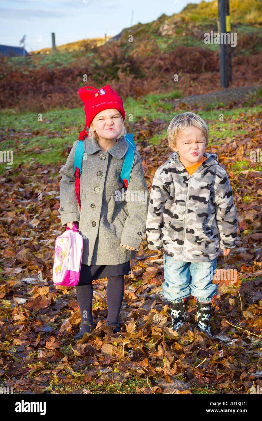 Kids Pulling Faces Stock Photo - Alamy