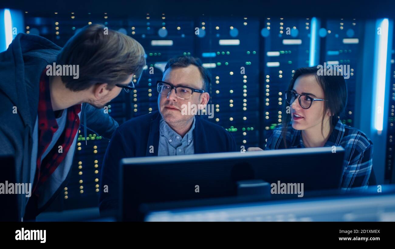 Male and Female IT Engineers Programmers Having Discussion about Coding ...