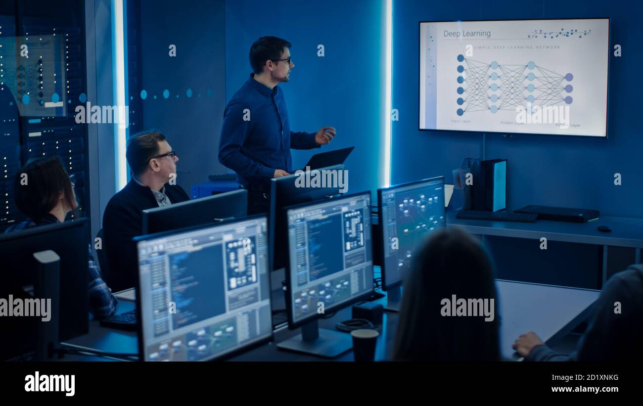 Team of Professional IT Developers Have a Meeting, Speaker Talks about ...