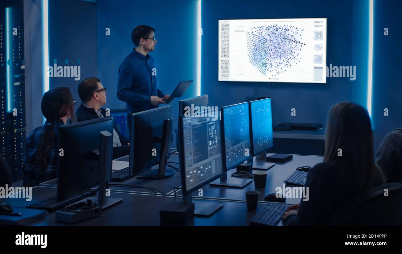 Team of Professional IT Developers Have a Meeting, Speaker Talks about ...