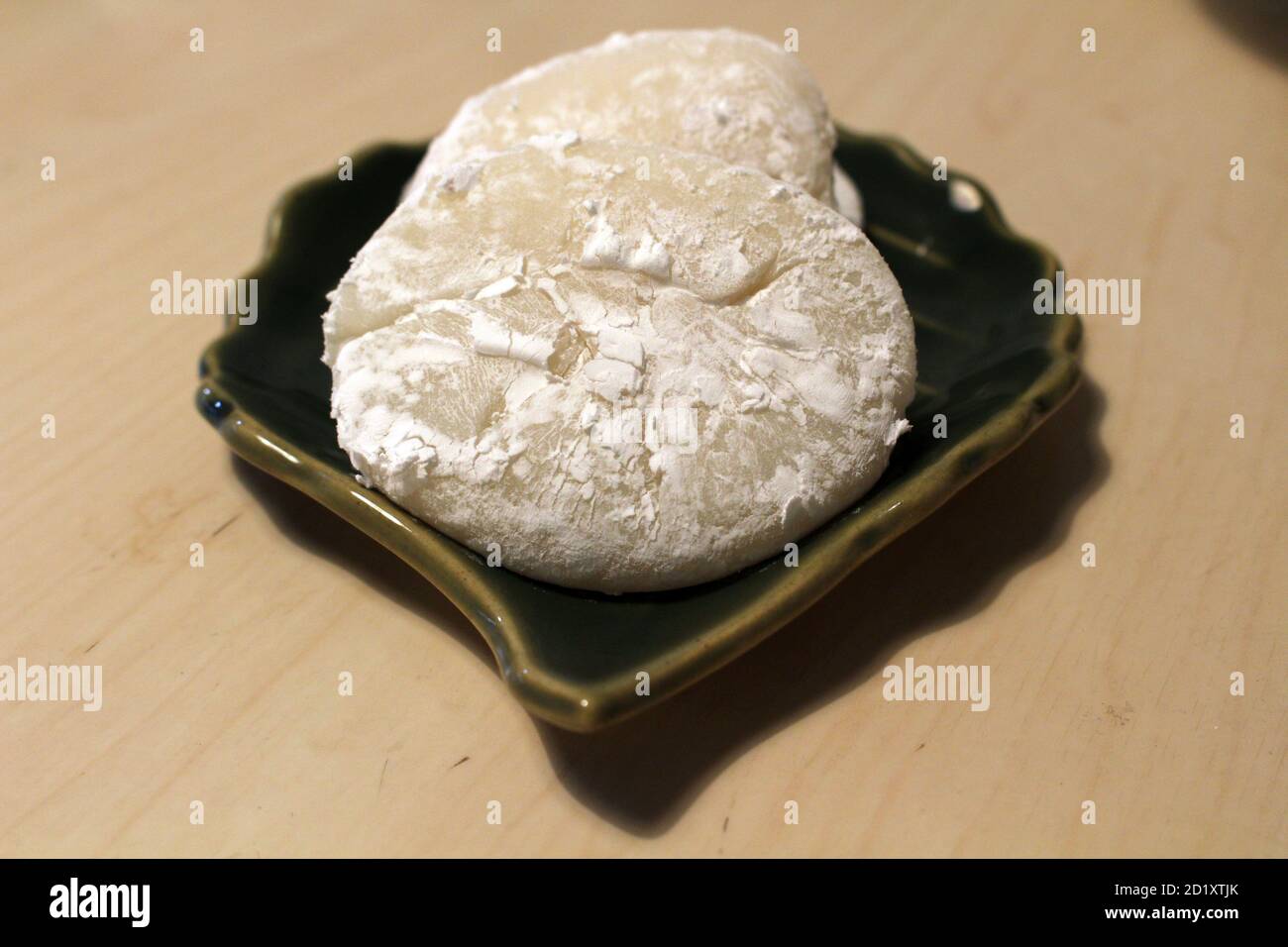 Closeup view on a single bun of Japanese plain mochi Stock Photo - Alamy