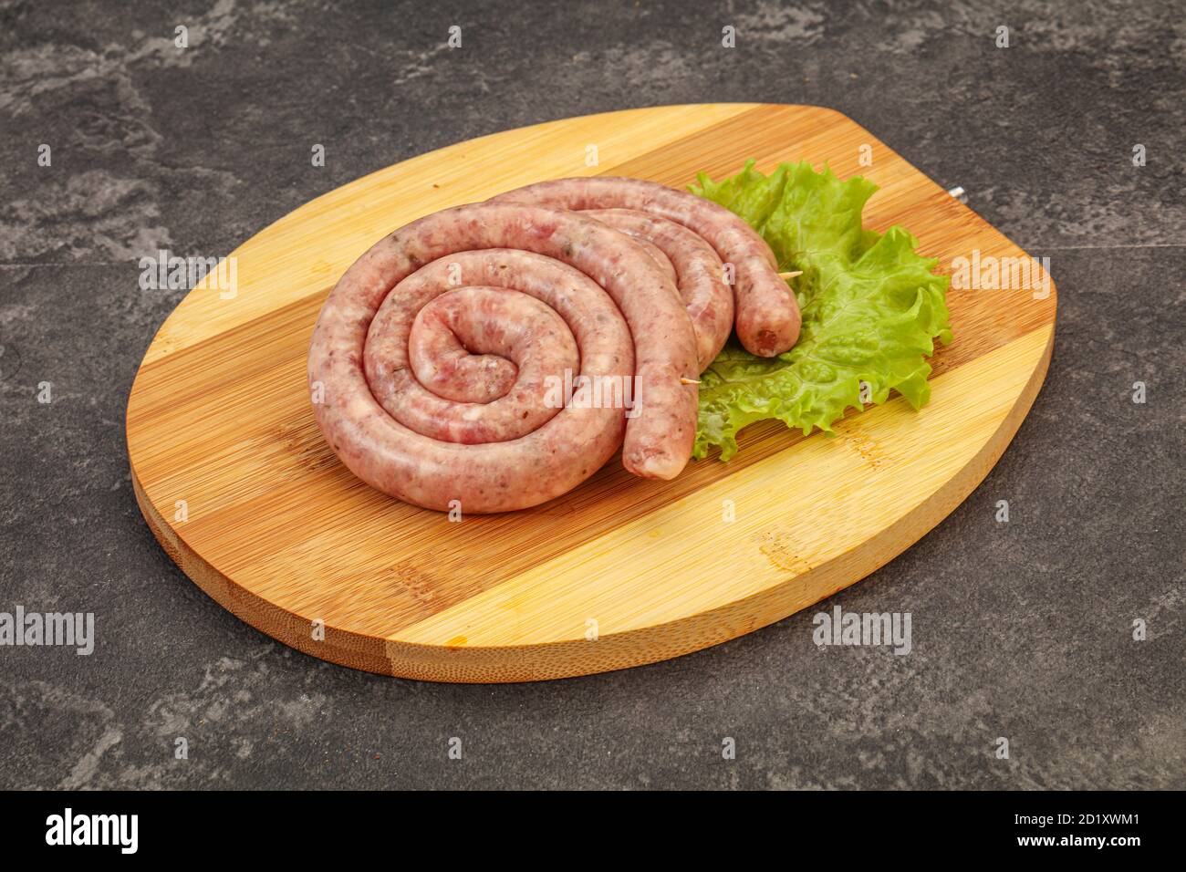 Raw pork sausage ring for grill Stock Photo - Alamy