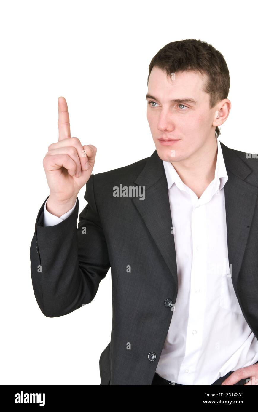 Young man in business suit points finger Stock Photo - Alamy