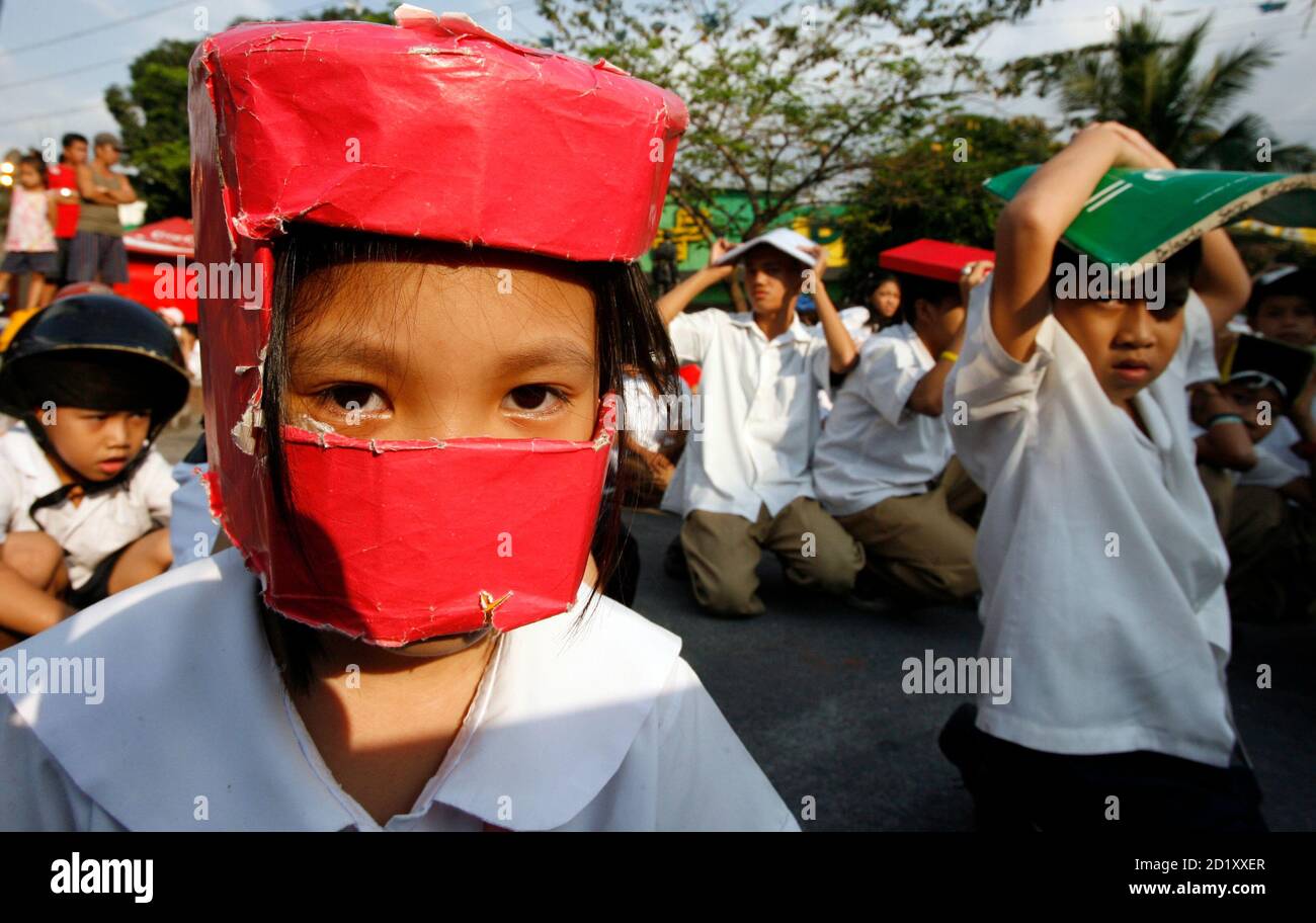 Head during earthquake drill hi-res stock photography and images - Alamy