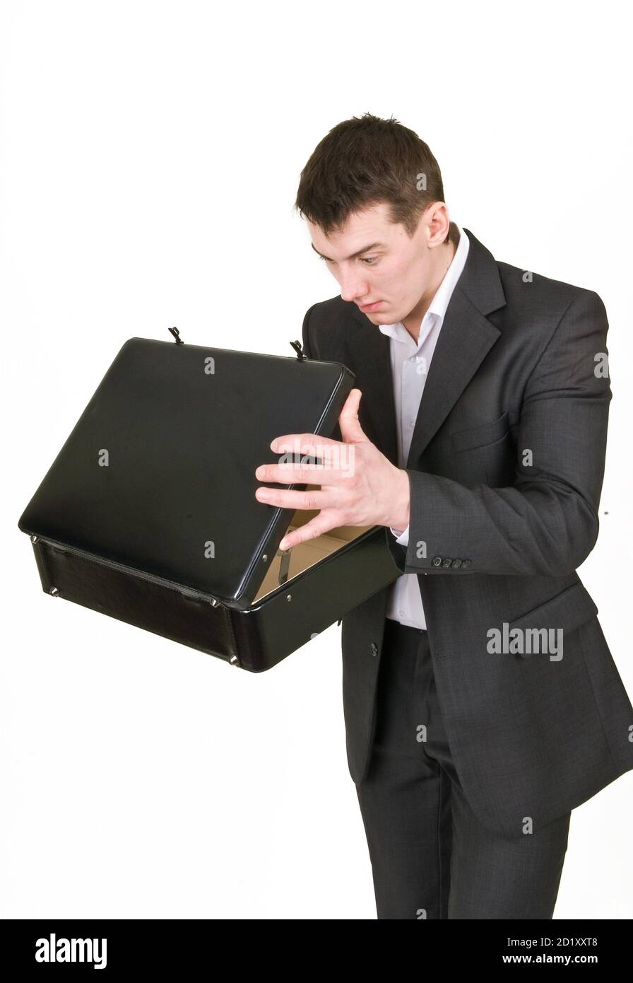 Young man in business suit with case Stock Photo - Alamy