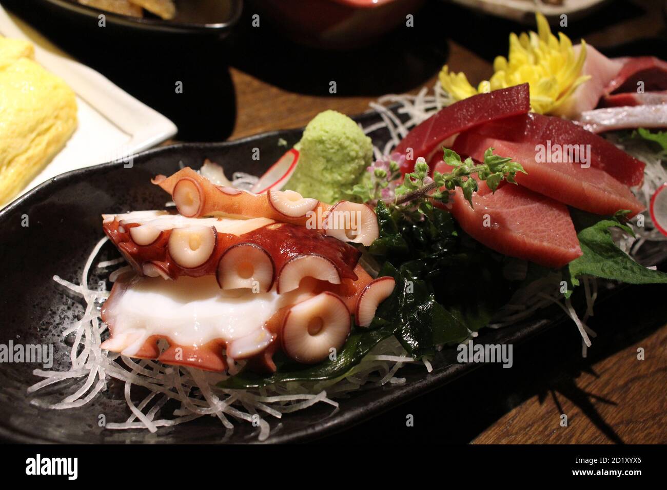 Japanese sashimi filled with fish and octopus, served at an izakaya ...