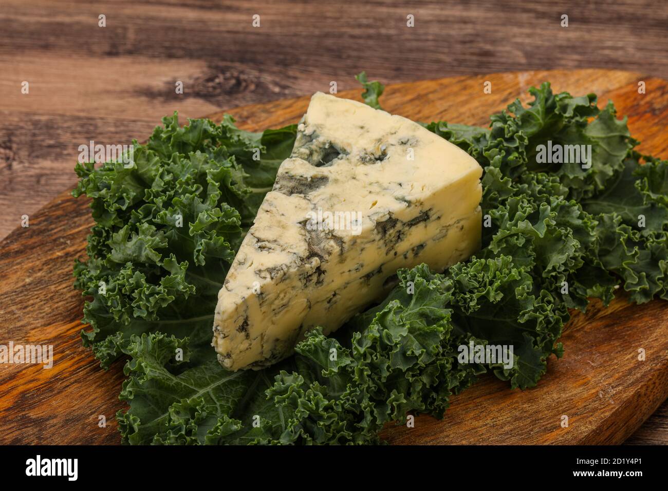 Dairy Blue cheese triangle with mold Stock Photo - Alamy
