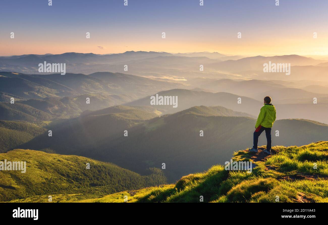 Person top of mountain aerial hi-res stock photography and images - Alamy