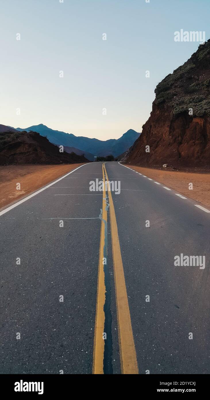 Vertical shot of a highway in an arid environment Stock Photo - Alamy