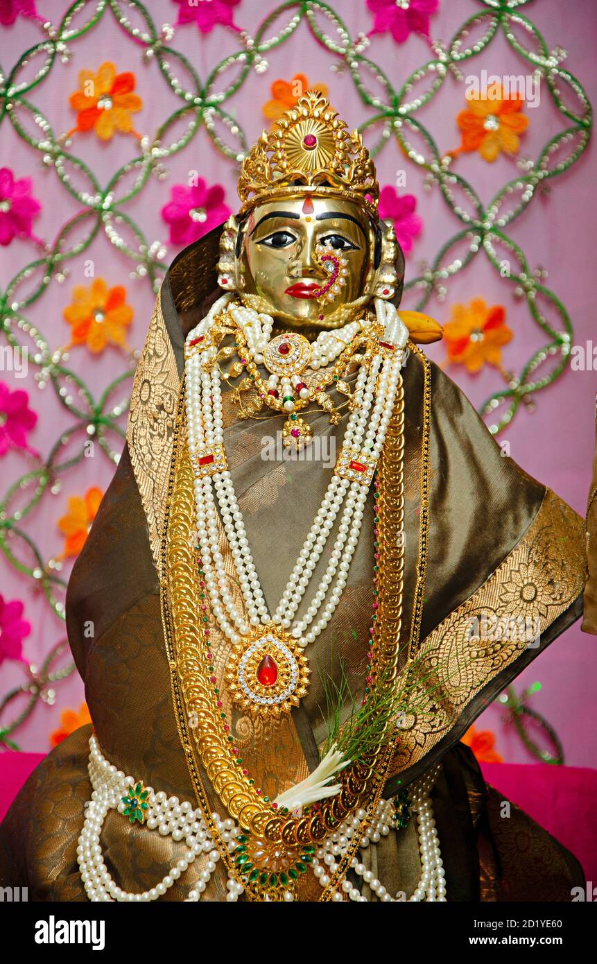 Goddess Gauri idol. Ganesha's sister with Golden Crown and Ornaments ...