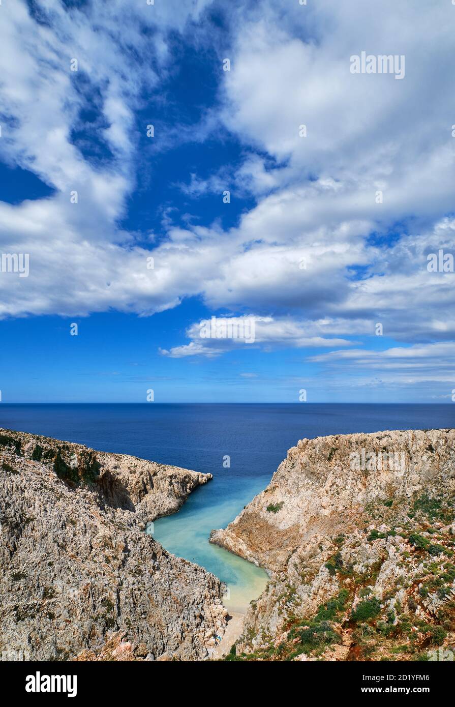 Vertical view of z-shaped cove in Greek or Cretan landscape on sunny ...