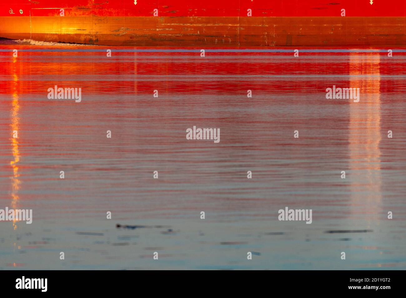 Abstract vibrant reflection of a boat on water surface Stock Photo - Alamy