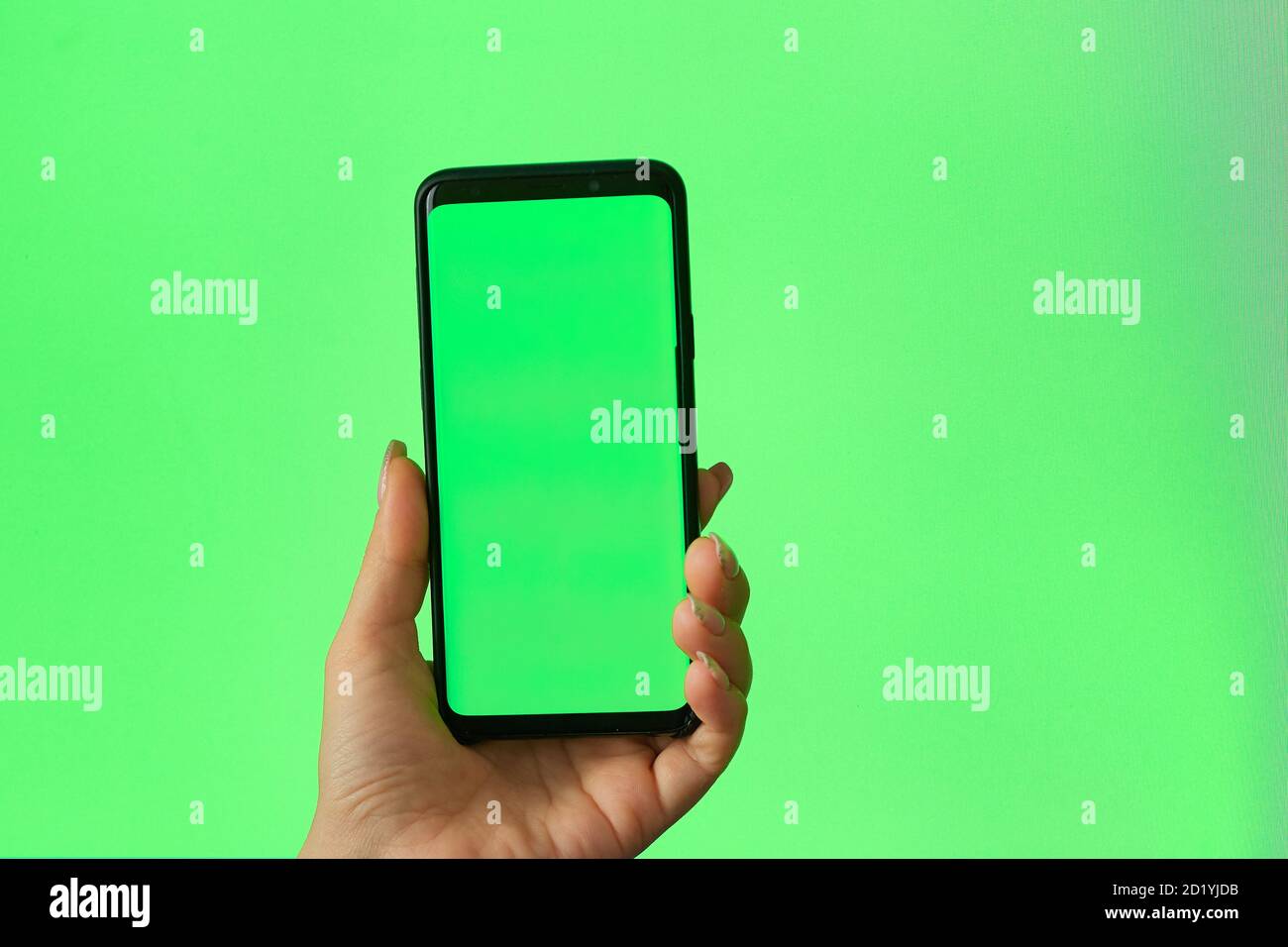 green screen phone woman using smartphone. Female hand touching ...