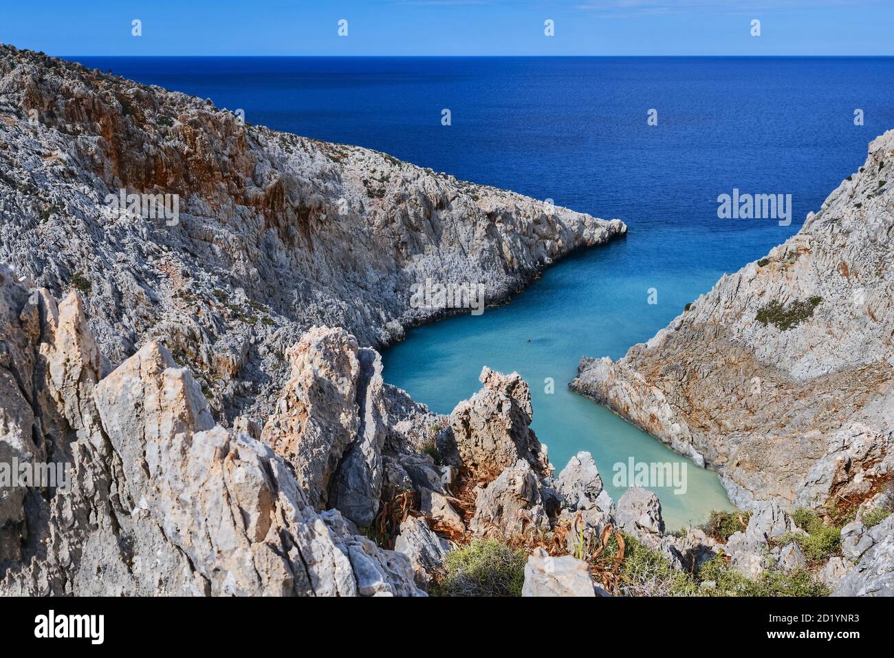 View of z-shaped bay, Greek landscape. Blue sky, beautiful clouds ...