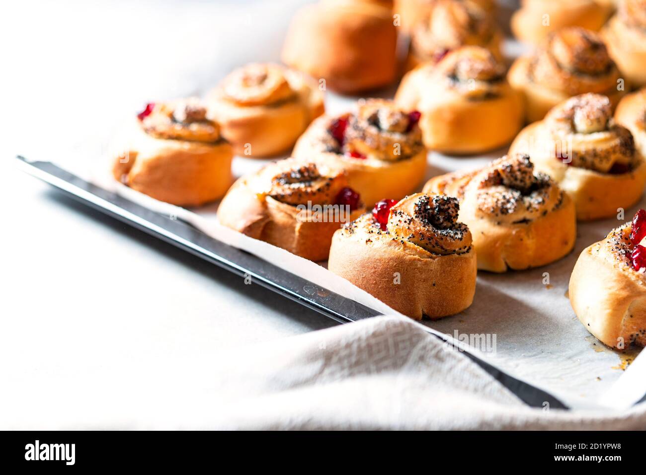 Homemade baking. Traditional bun with poppy seeds and sugar Stock Photo ...