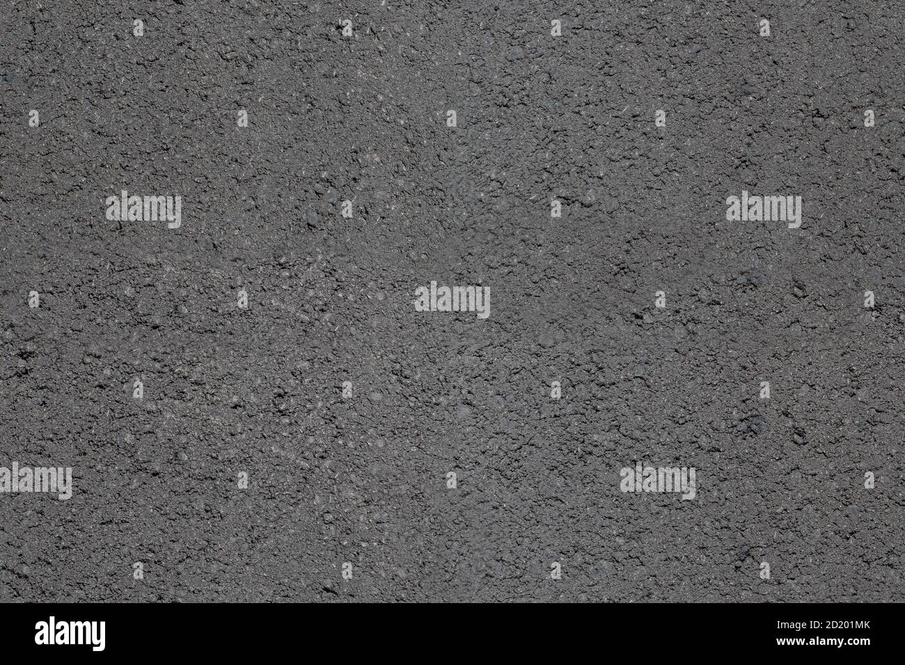 Smooth grey asphalt pavement texture with small rocks. Top view of road ...