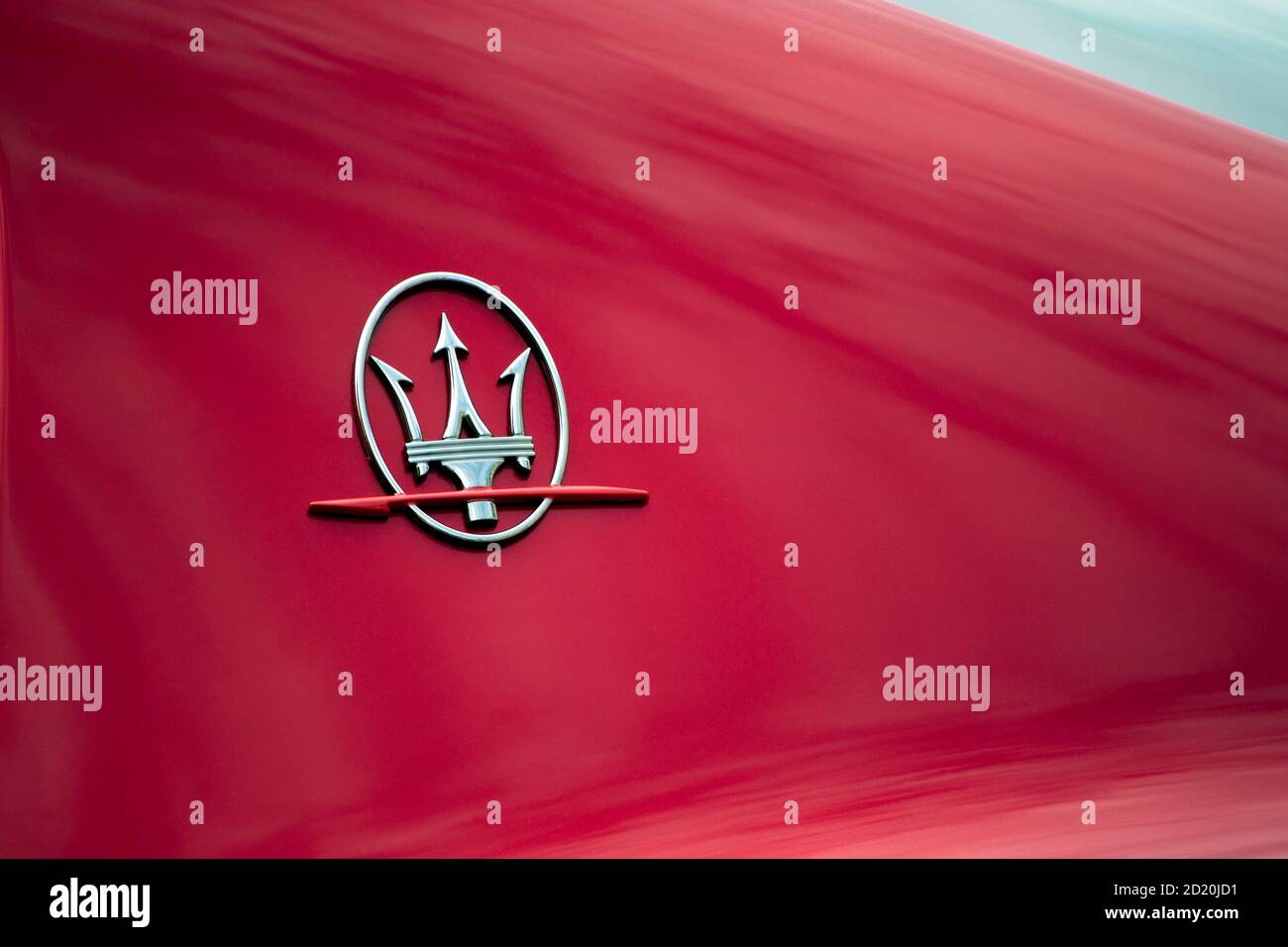 10/09/20 - Modena, Italy - Maserati logo on a red surface. concept lor ...