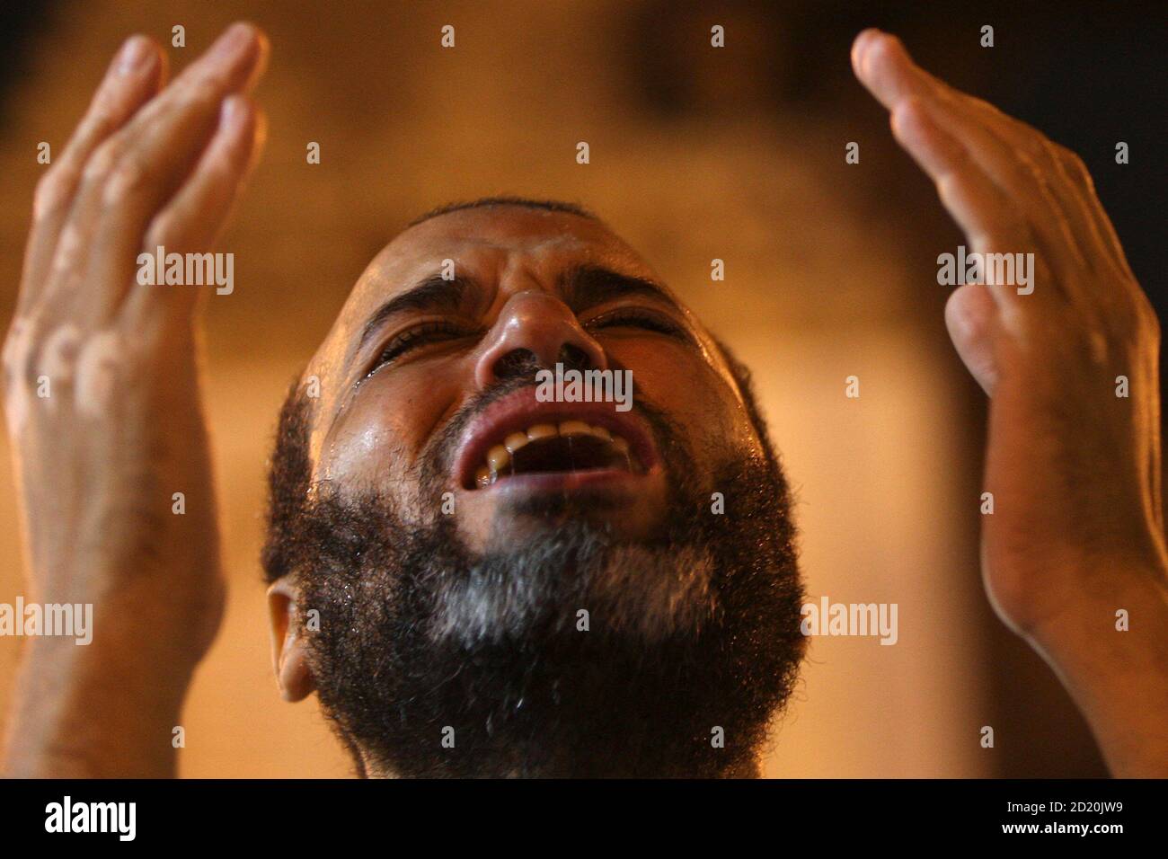 Egyptian man praying hi-res stock photography and images - Alamy