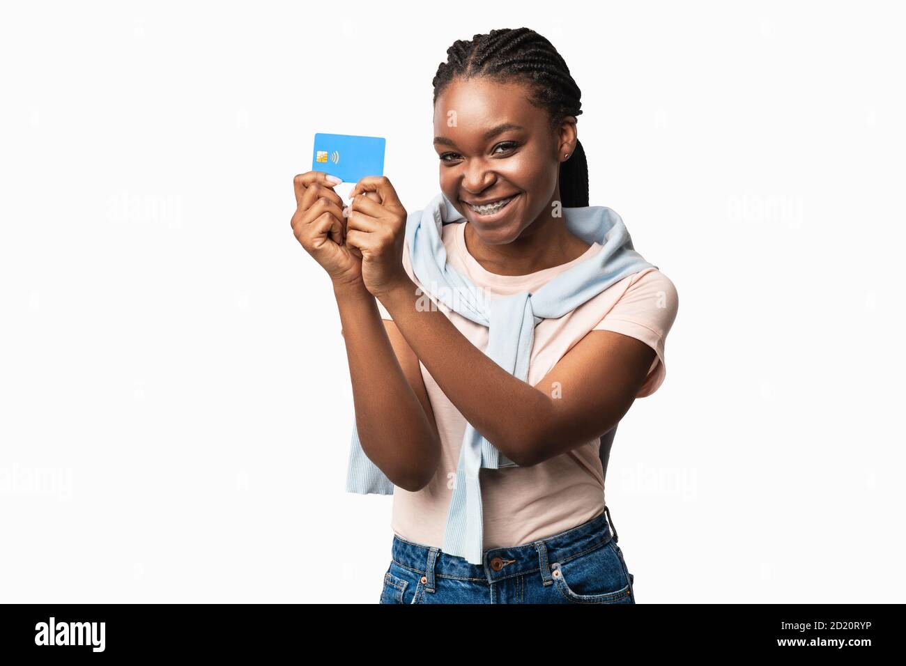African American Woman Showing Credit Card Standing Over White ...