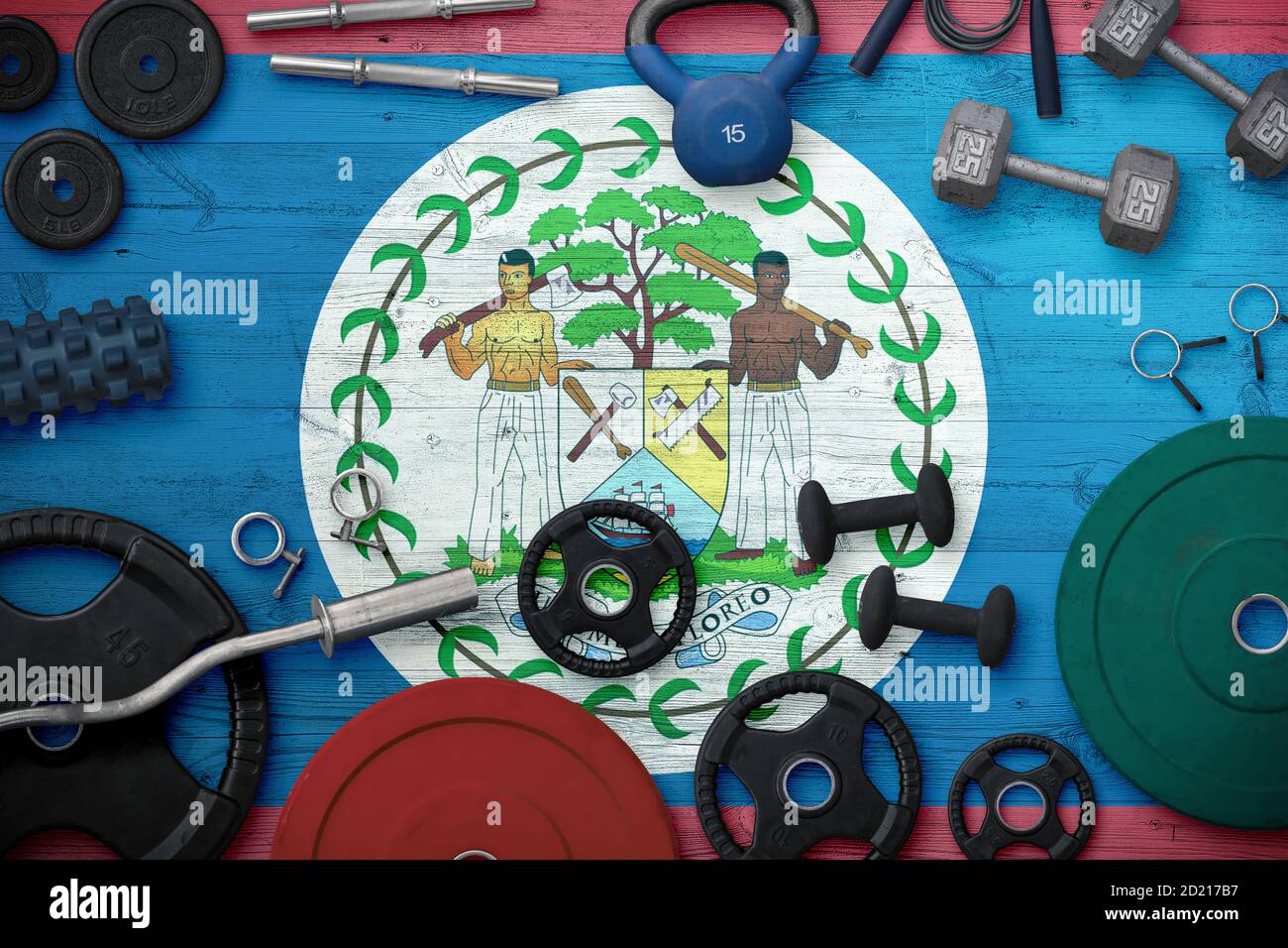 Belize sports and fitness concept. Top view of heavy weight plates with ...