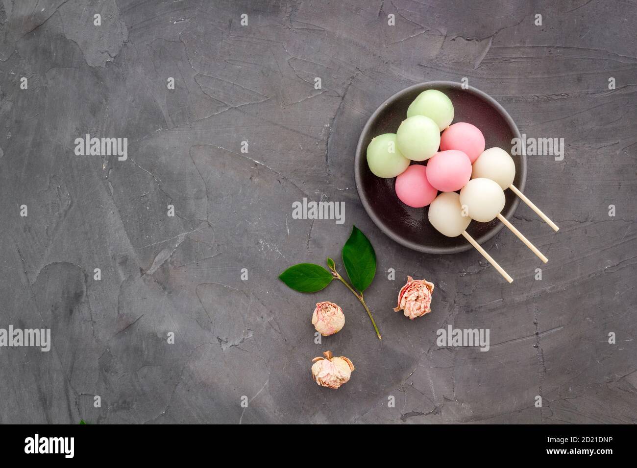 Japanese three colored dumplings Dango on plate, top view Stock Photo ...