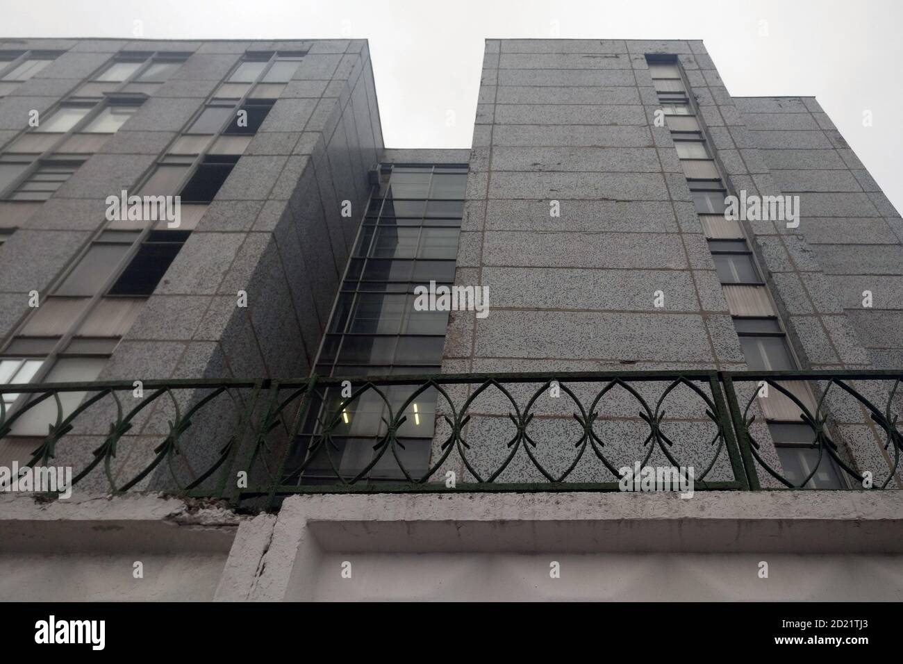 A dull gray building from the old days. Retro building was constructed ...