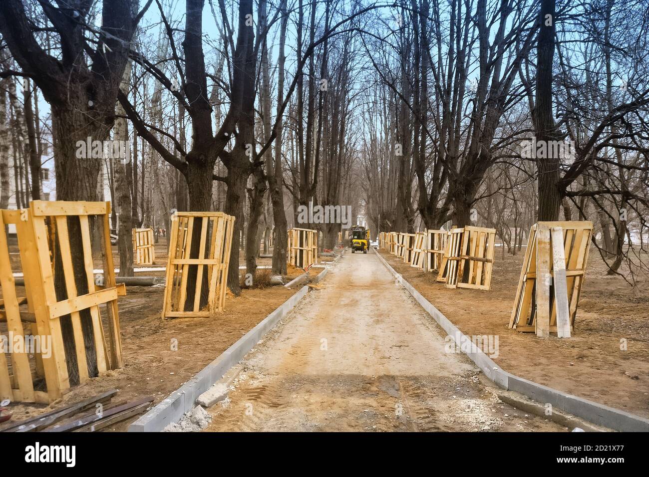 Repair of paths in parks. Protection of trees in the reconstruction of ...